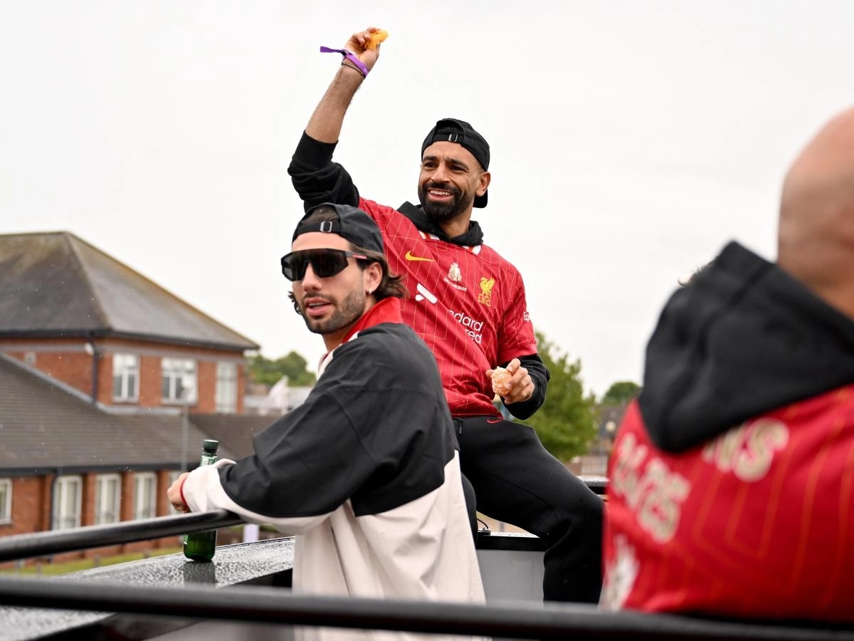 The best photos from Liverpool's open-top bus parade for Premier League ...