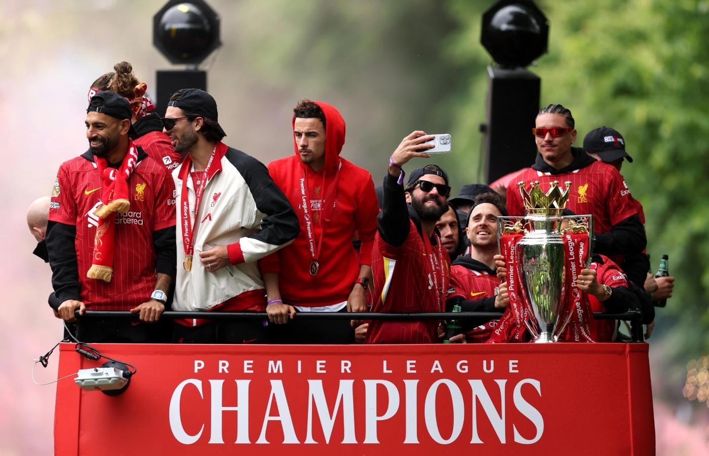 The best photos from Liverpool's open-top bus parade for Premier League ...