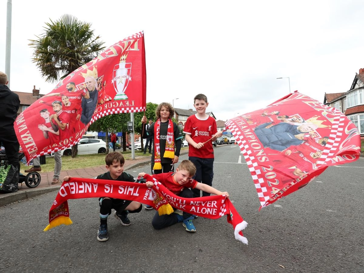 The best photos from Liverpool's open-top bus parade for Premier League ...