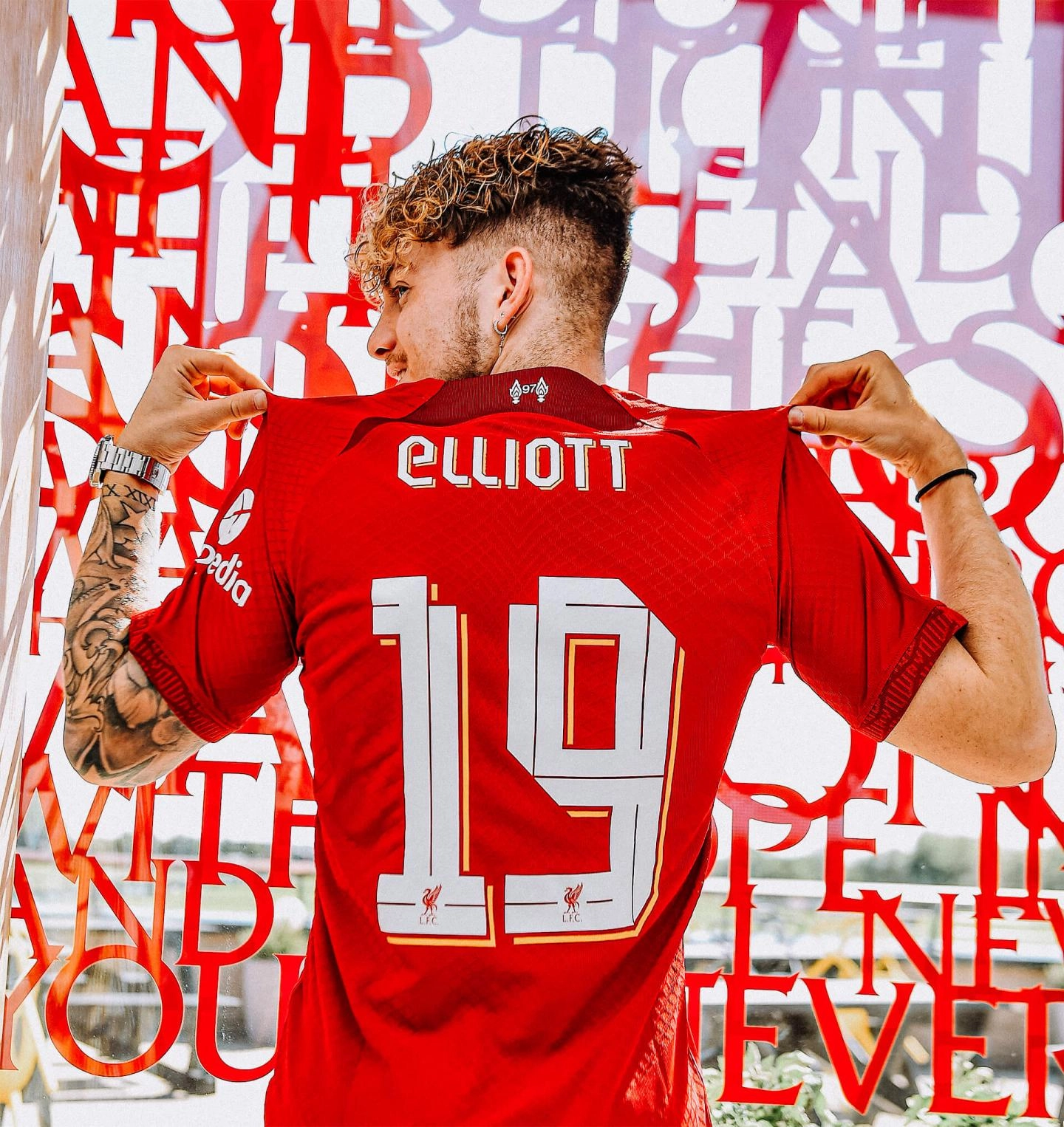Harvey Elliott poses with new No.19 Liverpool shirt - Liverpool FC